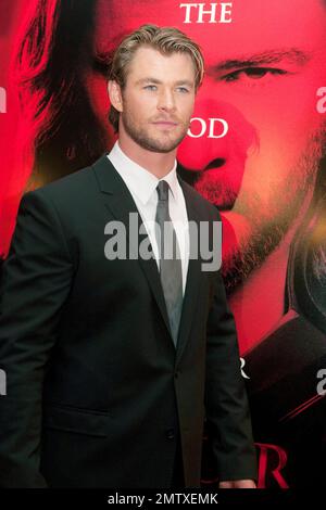 Australian actor Chris Hemsworth poses for the camera during the ...