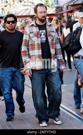Tom Green makes faces for the cameras as he strolls at The Grove ...