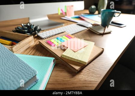 Designer's workplace with computer and color palettes in office Stock ...
