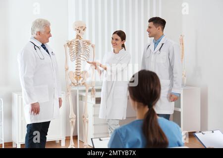 Medical students having lecture in orthopedics at clinic Stock Photo ...