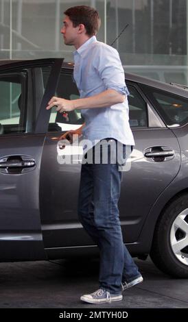 EXCLUSIVE!! Topher Grace leaves an LA hotel with what appears to be a ...