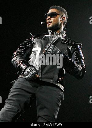 With sweat pouring from his face and clad in a buckle-detailed vest ...