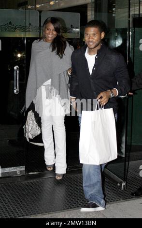 Usher and his wife Tameka Foster are all smiles as they leave the ...