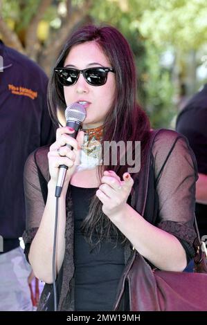 Singer Vanessa Carlton signs autographs for fans at an event promoting ...