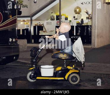 Verne Troyer shows off ride. The Mini Me actor posed with a tour bus ...
