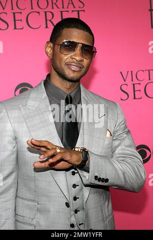 Singer Usher appears on the Victoria's Secret Fashion Show Pink Carpet ...
