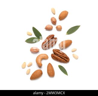 Different delicious nuts on white background, flat lay Stock Photo - Alamy