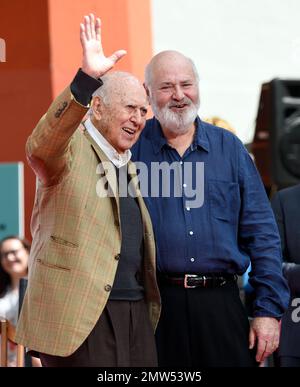 Carl Reiner, left, and his son Rob Reiner, center, pose with guest ...