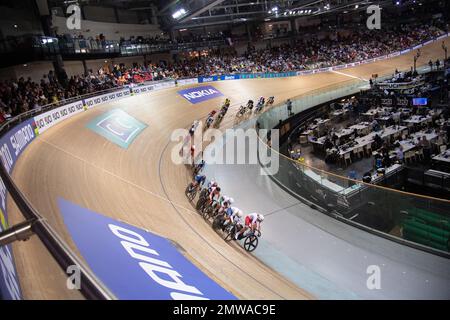 Riders single file in the points race of the omnium, in front of French ...