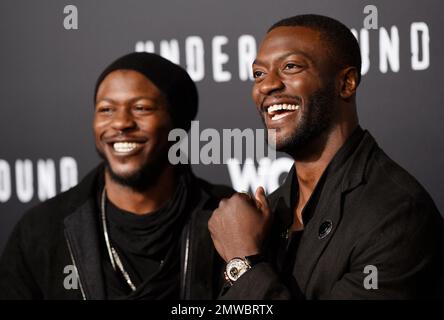 Aldis Hodge, right, a cast member in "Underground," poses with his ...