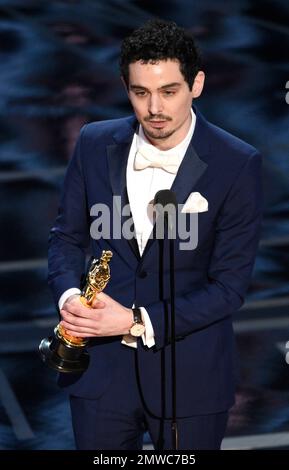 Damien Chazelle accepts the award for best director for "La La Land" at ...