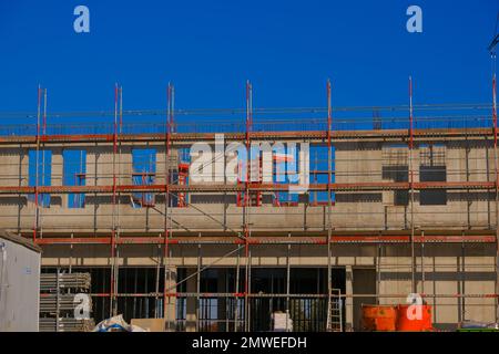 Scaffolding and construction. house in scaffolding .Foundation and ...