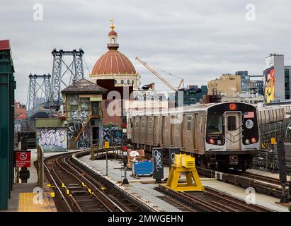 Subway train pulls into the Marcy Street elevated subway station in the Williamsburg ...