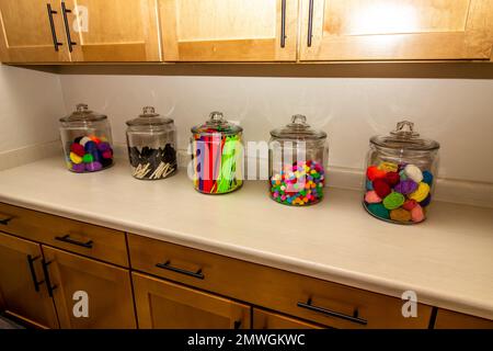 Five Glass Containers On Laundry Room Counter Stock Photo - Alamy