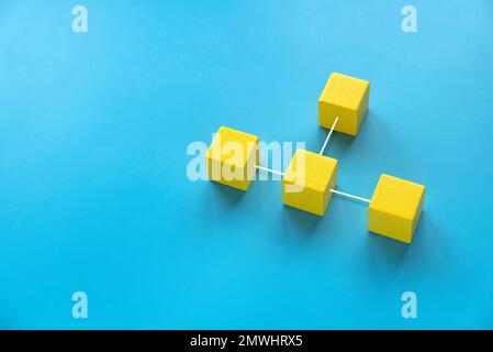 Company hierarchical organizational chart of blocks on yellow ...