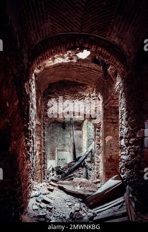 An abandoned place with natural light seeping through the window in the ...