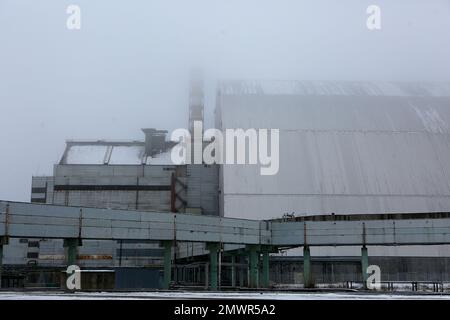 A new shelter is installed over the exploded reactor at the Chernobyl ...