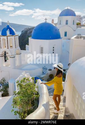 Happy Asian woman visit Oia Santorini Greece during summer with ...