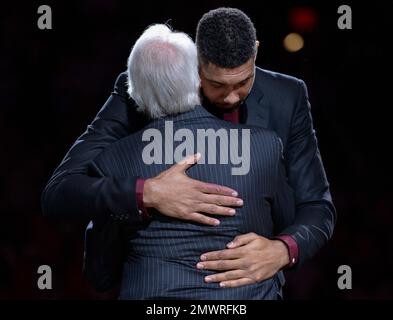 San Antonio Spurs legend Tim Duncan, second from right, laughs with ...