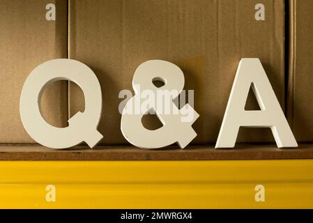 Question and answers concept. Wooden alphabet of letter q and a Stock ...