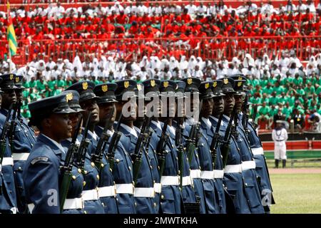 Kenyan Navy personnel take part in the trooping of the colour parade ...