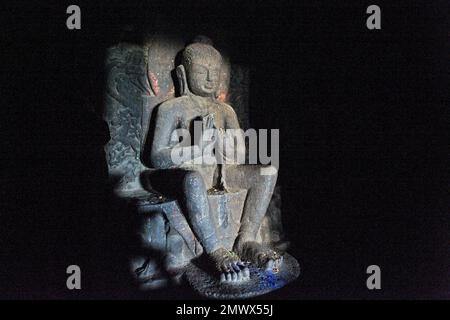 Cave 9: Buddha seated on throne with attendants and devotees. Ajanta ...