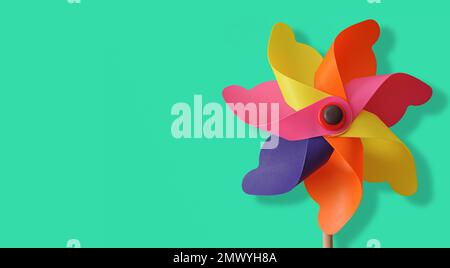 Flat lay Rainbow pinwheel on white background, copy space Stock Photo ...