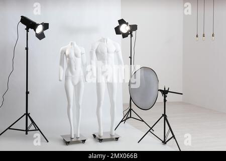 Modern ghost mannequins in professional photo studio Stock Photo - Alamy