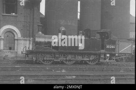 LSWR G6 0-6-0T 30266 steam locomotive (withdrawn 1961) at brighton mpd ...