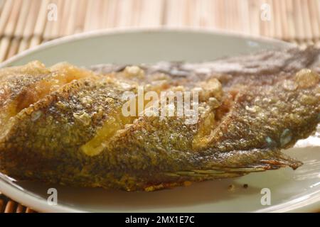 deep fried snake skin catfish or gourami on dish Stock Photo - Alamy