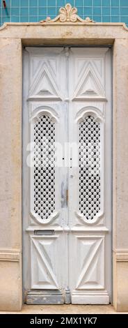 Close view of beautiful details of typical doors and azulejo tiles ...