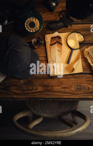 Flat lay composition with vintage detective items on wooden background ...