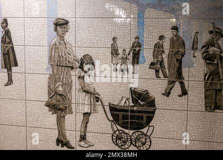 Mosaic tiles of people in the 63rd street station on the F subway line ...