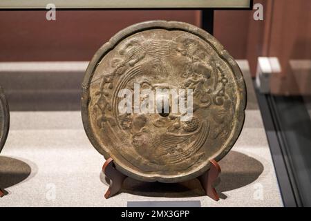 A close-up of a bronze mirror relic used in ancient China Stock Photo ...