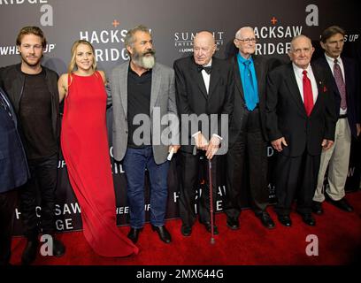 Mel Gibson and Teresa Palmer pose for a photograph on arrival for the ...