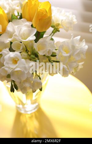 Flowers in a vase (Freesia, Tulip, Orchid Stock Photo - Alamy