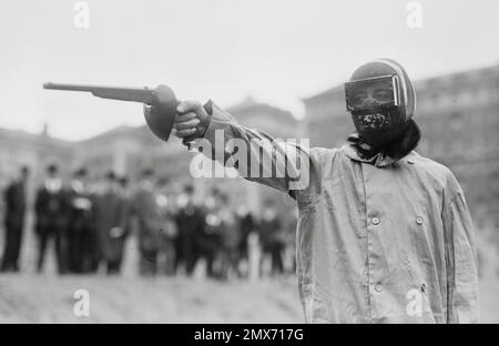 A photograph of a dueller in New York, pointing and using wax bullets ...