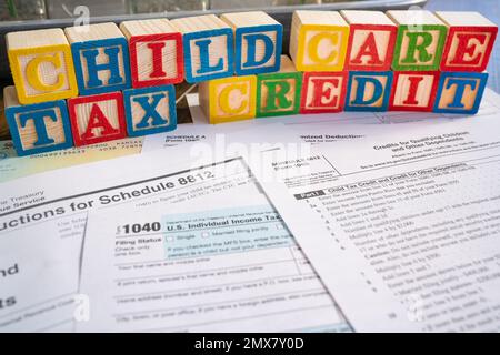 Tax Return form 1040 with credit card on graph, U.S. Individual Income ...