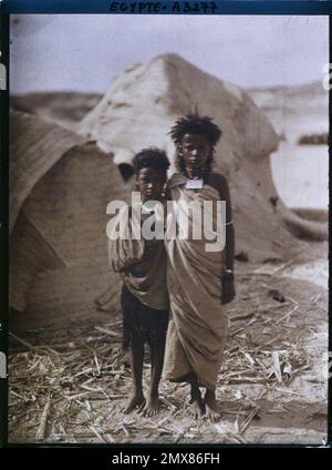ASSOUAN, Egypt, Africa Two children Bishari pose for the operator in ...
