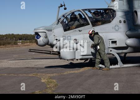 Ordnance Marines with Marine Light Attack Helicopter Squadron 775 ...