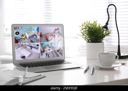 Laptop with view from CCTV cameras. Home security system Stock Photo ...