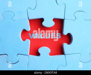 puzzle with words on red background concept: Solution Stock Photo - Alamy
