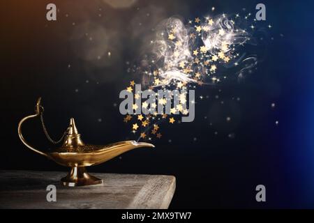 Genie appearing from magic lamp of wishes. Fairy tale Stock Photo - Alamy