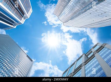 Office buildings with tinted windows, low angle view. Modern ...