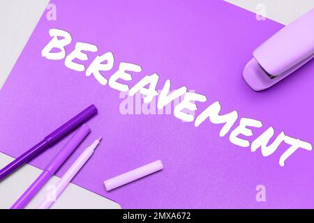 Sign displaying Bereavement. Word Written on a period of mourning after ...