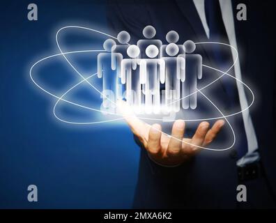 Man demonstrating virtual structure of organization, focus on hand ...