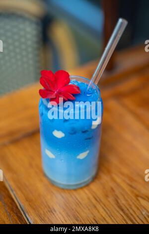 delicious milkshakes on the bar counter in a glass jar with a straw ...