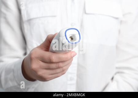 A closeup view of non-contact medical infrared thermometer from all ...