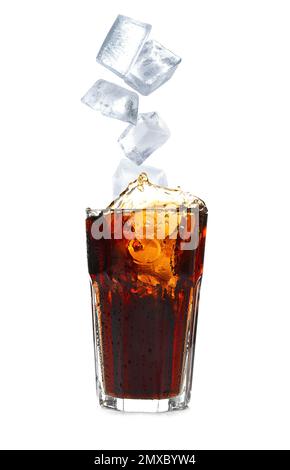 Ice Cubes Falling into Glass of Coke against White Background Stock ...