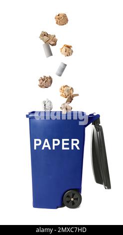 Different paper garbage falling into trash bin. Waste management and ...